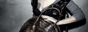 Conheça a história da marca Prada - Símbolo de Luxo